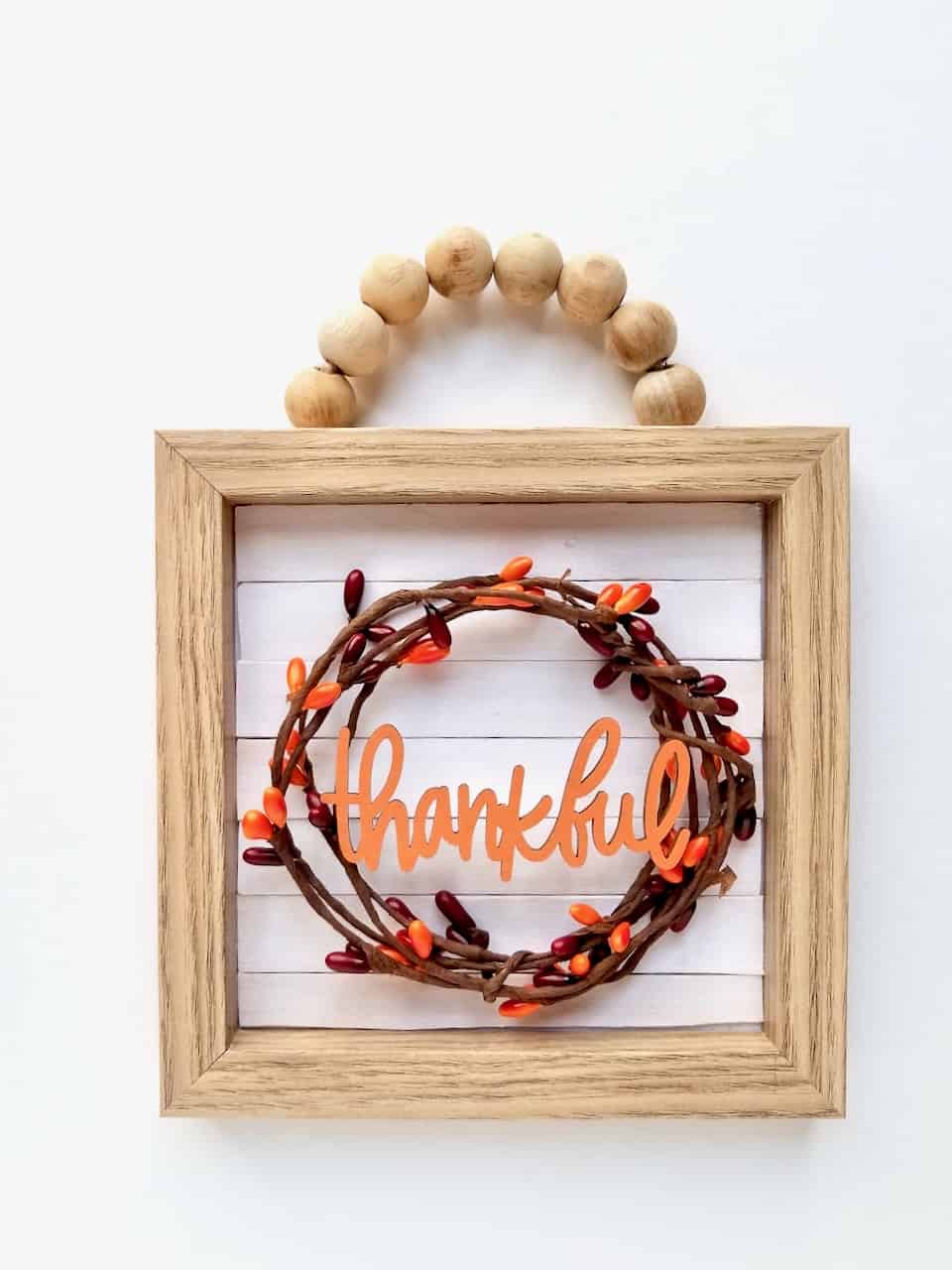 DIY Wood Bead Sign Using Dollar Tree Calendars | We Three Shanes