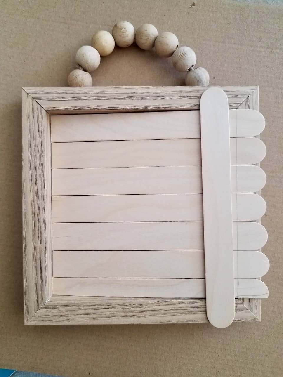 DIY Wood Bead Sign Using Dollar Tree Calendars | We Three Shanes